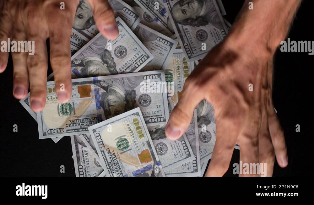 Hands grabbing money Stock Videos & Footage - HD and 4K Video Clips - Alamy