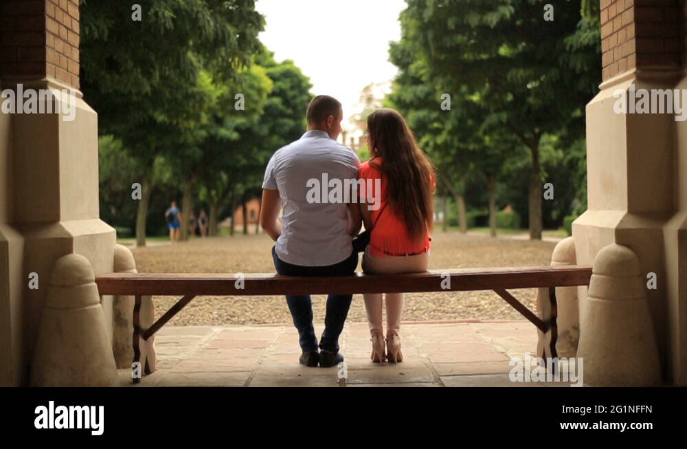 Family sitting on bench looking at camera Stock Videos & Footage - HD ...