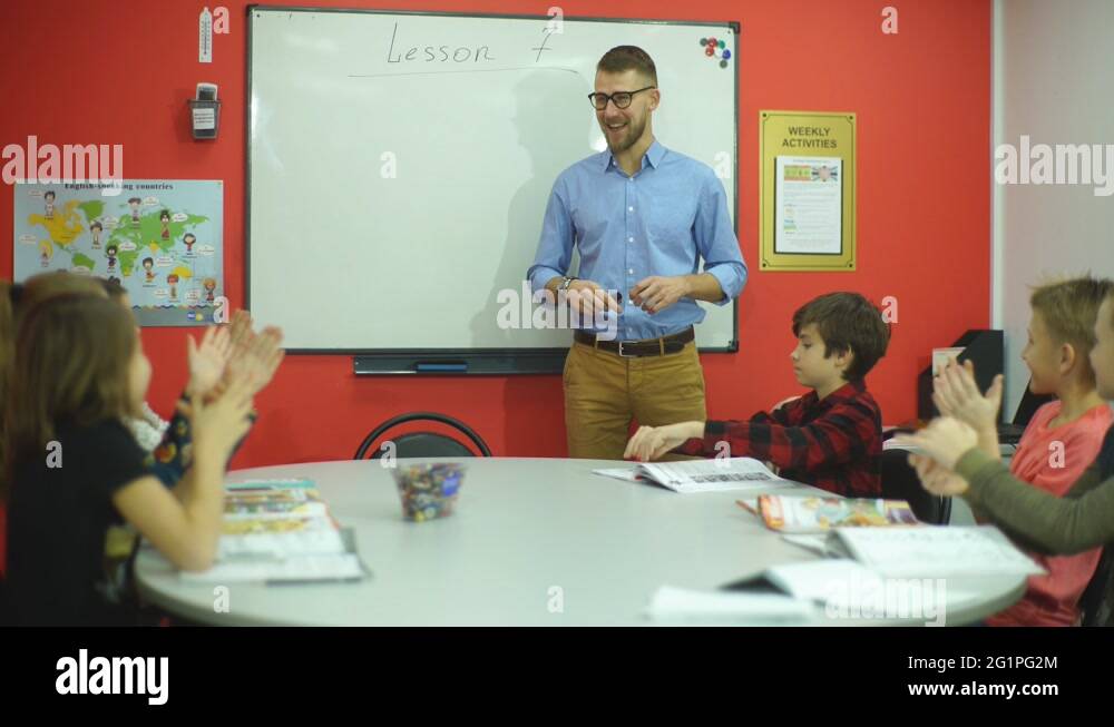 Happy teacher and students classroom Stock Videos & Footage - HD and 4K ...