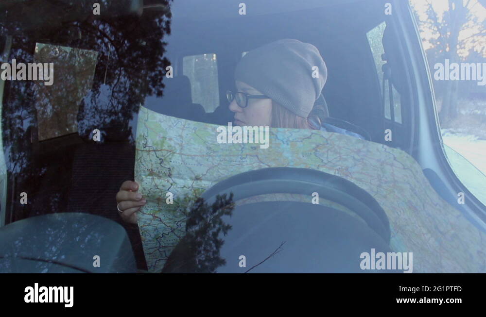 Woman map reading lost car Stock Videos & Footage - HD and 4K Video ...
