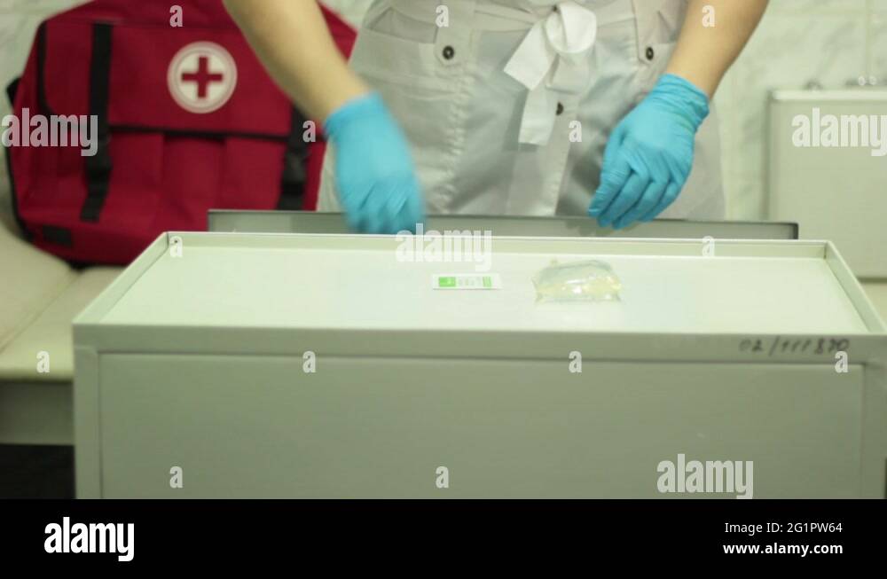 Female nurse preparing medication for injection Stock Video Footage - Alamy