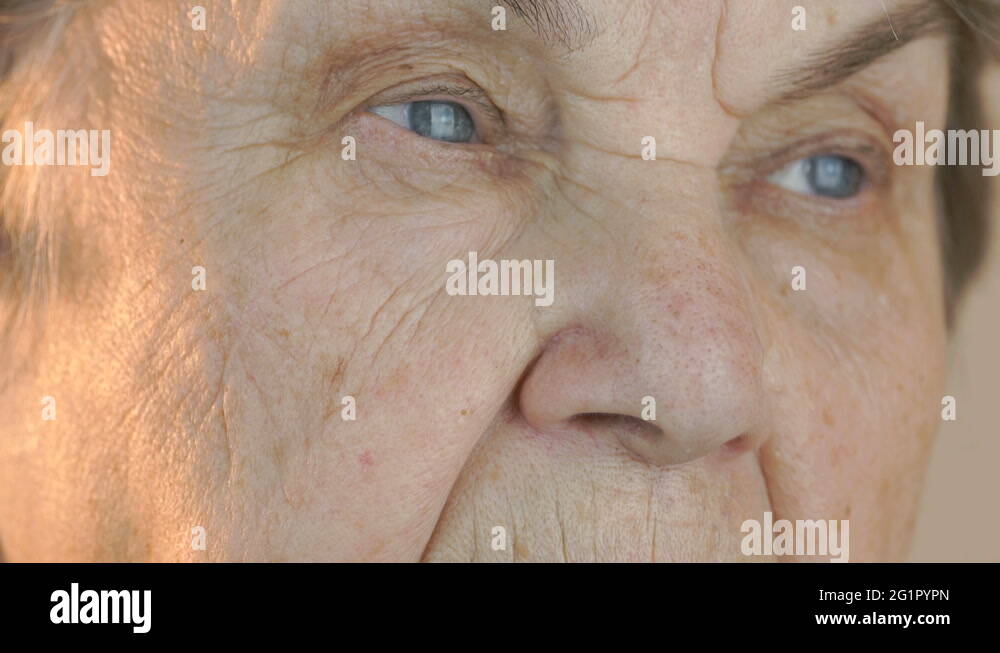Old woman's face with disturbing look of face Stock Video Footage - Alamy