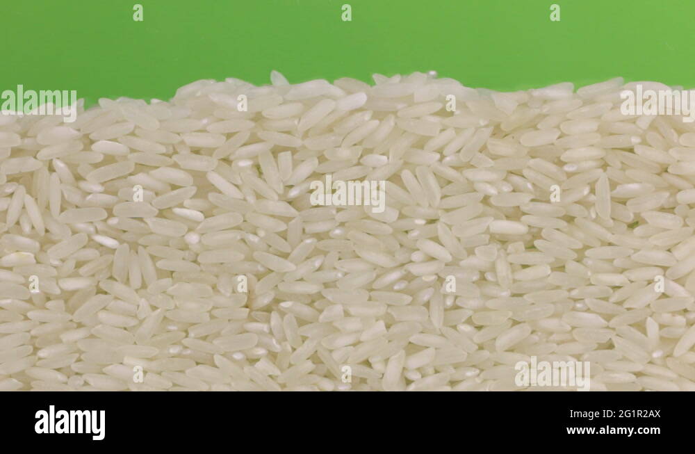 Rice grains close the (to bury) green screen Stock Video Footage - Alamy