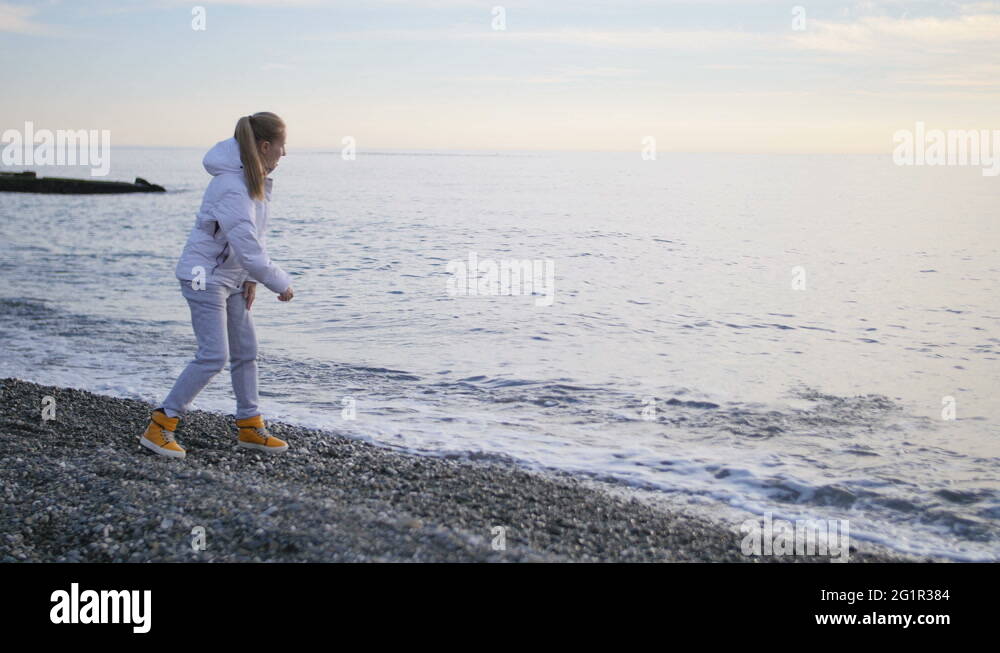 Woman throwing pebbles in water Stock Videos & Footage - HD and 4K ...