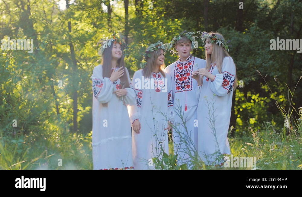 Midsummer. A group of young people of Slavic appearance at the ...