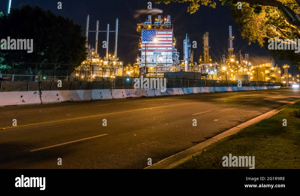 MoCo Timelapse of Oil Refinery Chemical Plant with USA Flag -Tilt Up ...