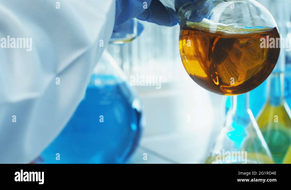 Pouring chemicals in a laboratory Stock Videos & Footage - HD and 4K ...