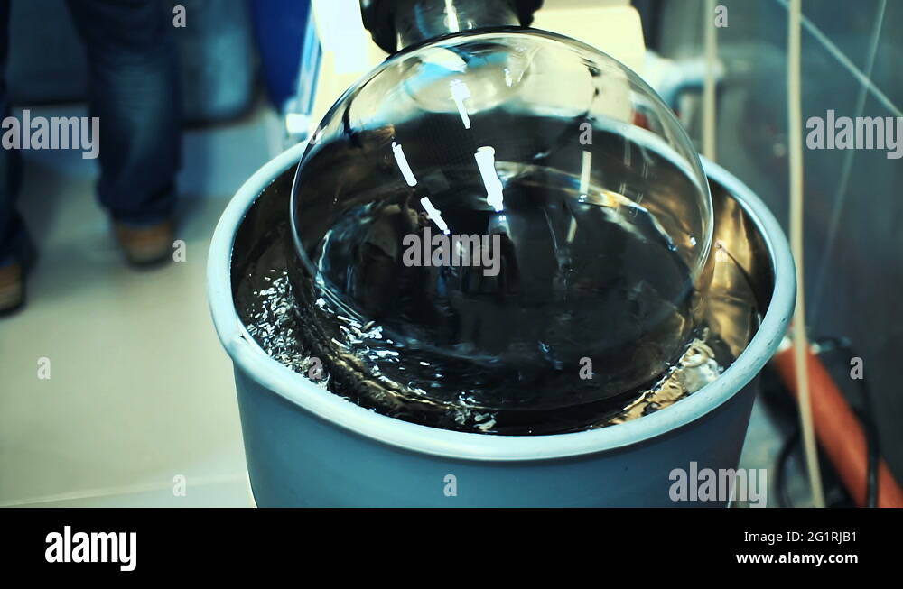 Rotating flasks, vessel test tubes with liquid organic chemical science ...