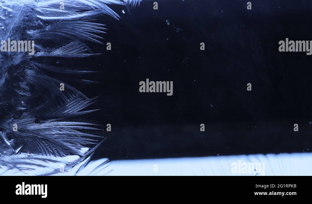 frozen pattern cover the dark background from left to right Stock Video ...