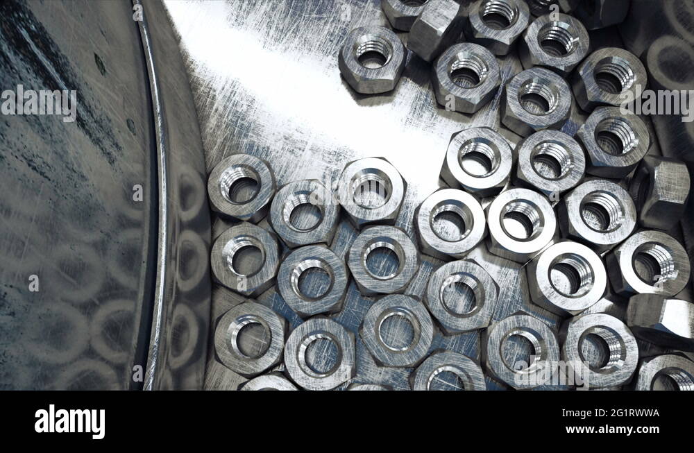 Process of production of nuts, screws. Industrial concept. Factory ...