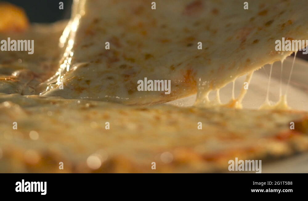 Pizza slice dripping Stock Videos & Footage - HD and 4K Video Clips - Alamy