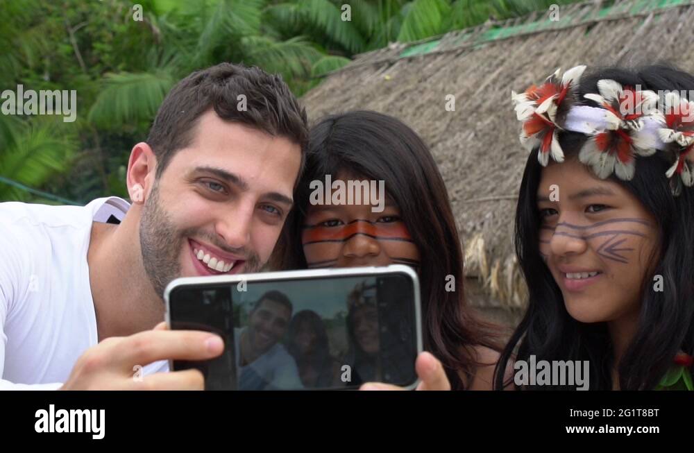 Tourist taking a selfie with Brazilian Natives - Indigenous People ...
