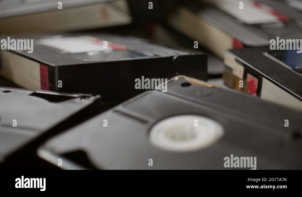 Scattered old VHS tapes Stock Video Footage - Alamy