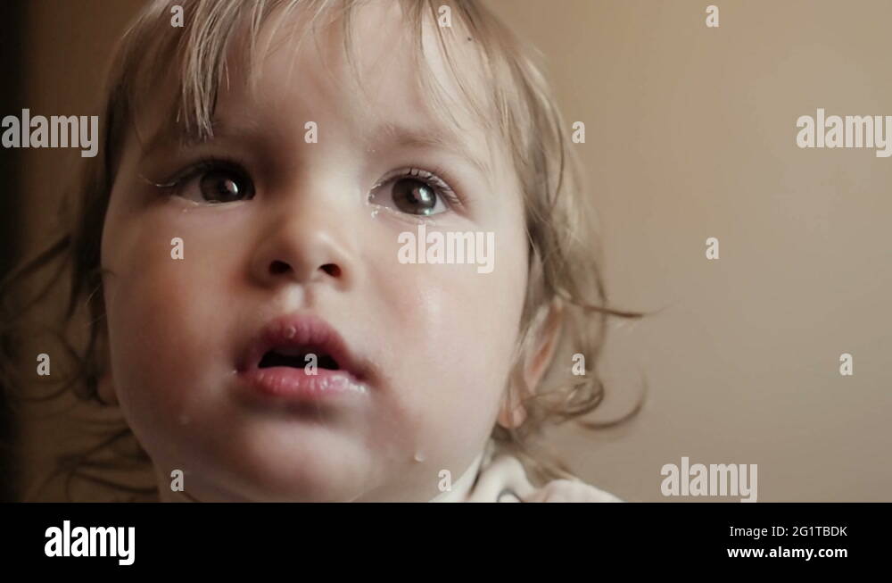 Portrait of crying boy, visible tears on face. Weeping sad kid. Pensive ...