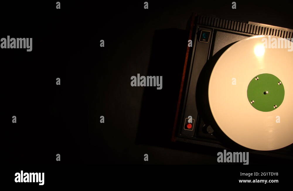 Vinyl record pleer. Plays song from an old turntable 4k top view Stock ...