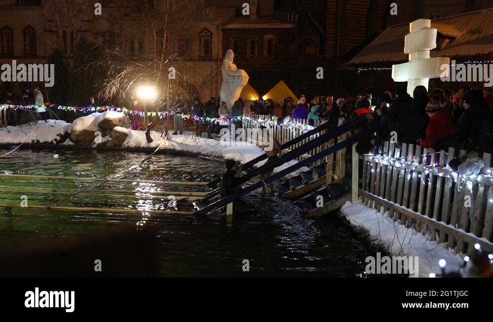 Baptism of Jesus holiday. Epiphany bathing in Jordan ice hole Stock ...