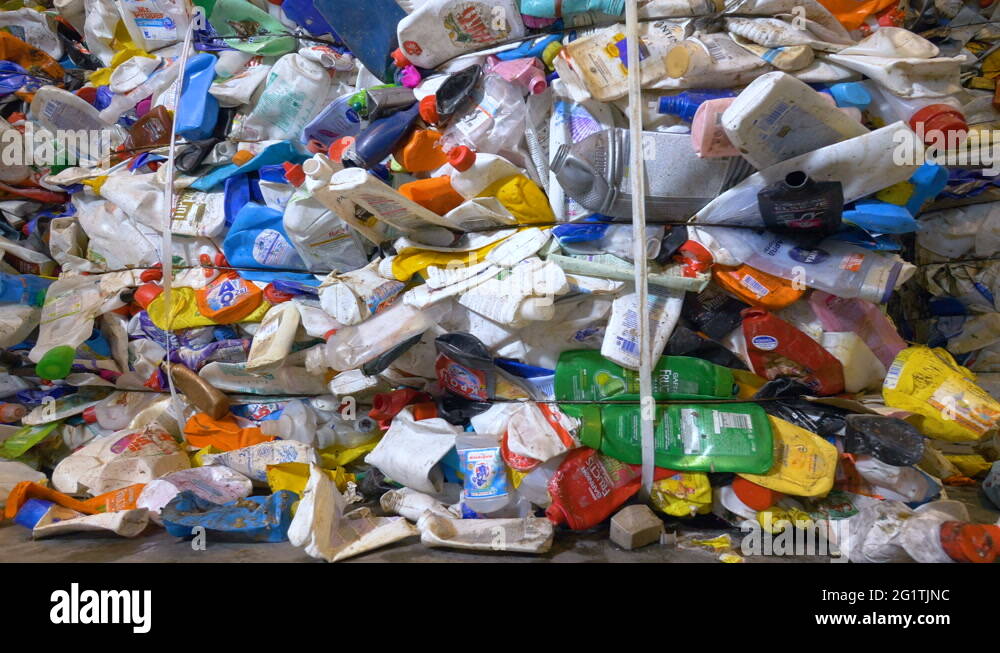 Plastic waste pressed and tied up compactly Stock Video Footage - Alamy