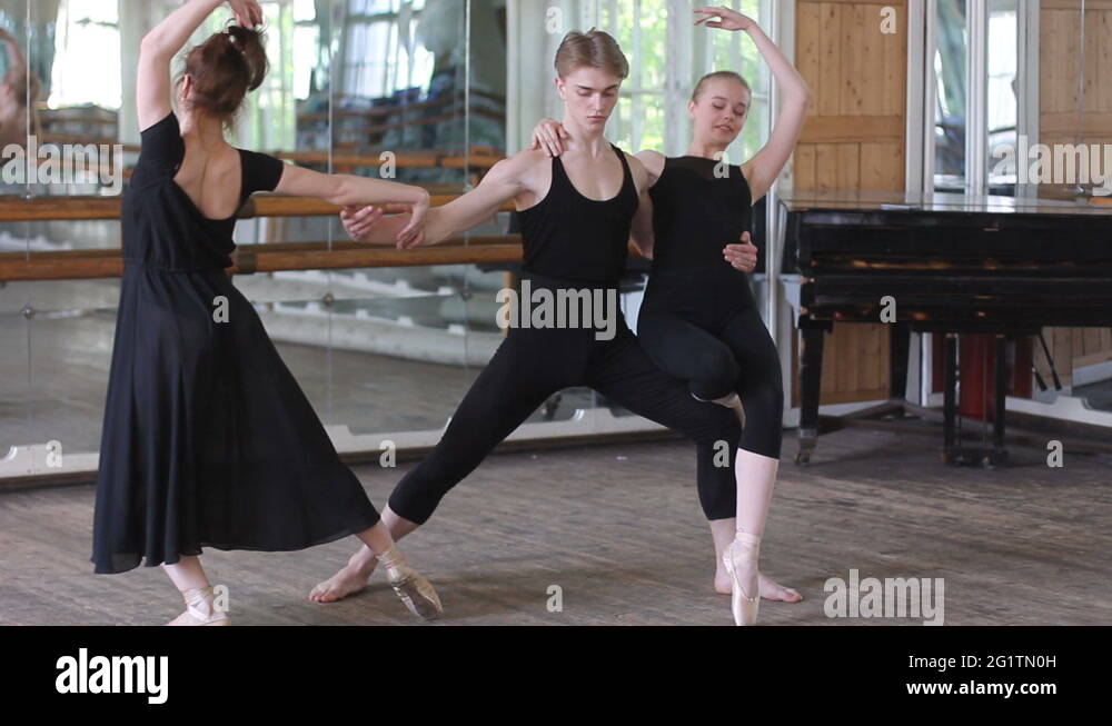 Three ballet dancers do ballet element Stock Video Footage - Alamy