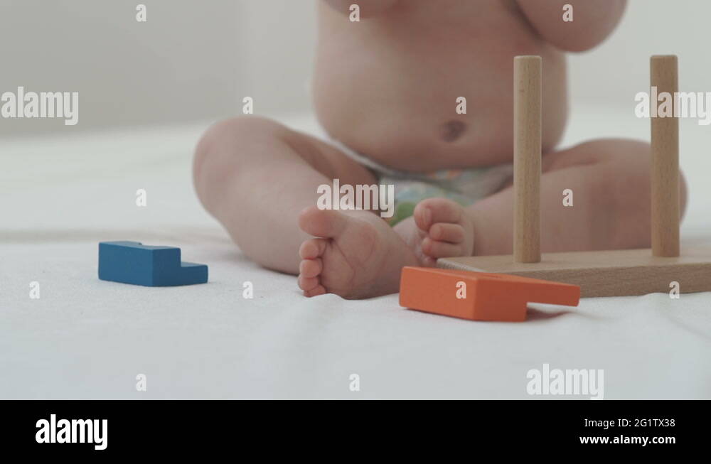 Baby stands holding on wall Stock Videos & Footage - HD and 4K Video ...