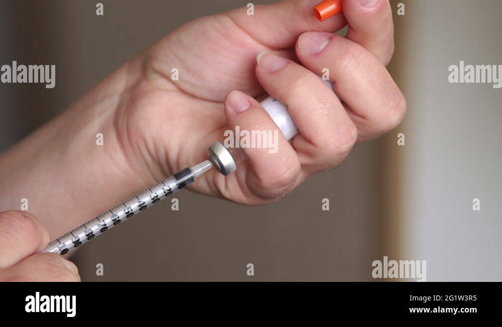 Girl fills a syringe for insulin injections. 4K Stock Video Footage - Alamy