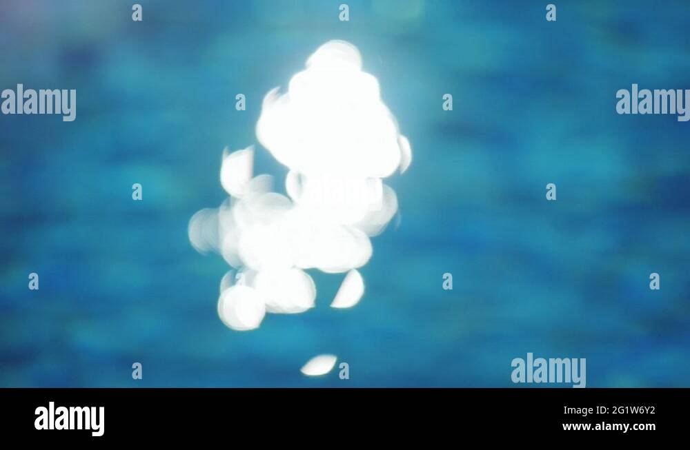 Refraction of sunlight in swimming pool water. Blurred pool water ...
