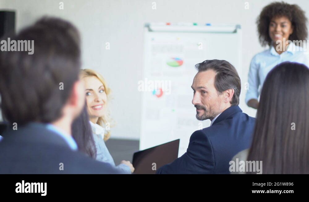 Business people talking during presentation Stock Videos & Footage - HD ...