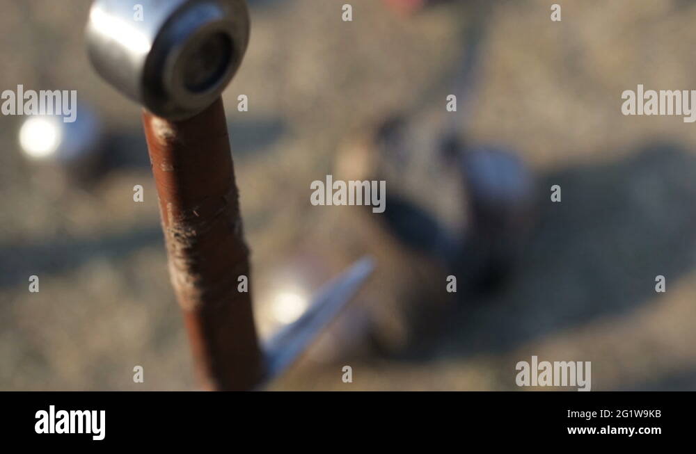 Medieval sword in the ground against the background of armor Stock ...