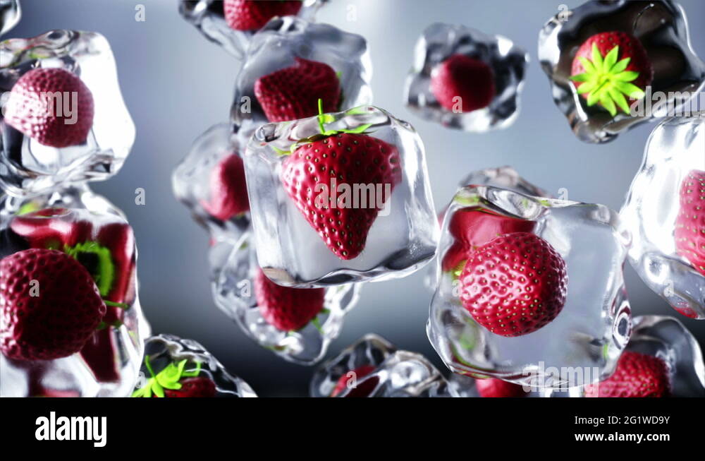 strawberry rotate in ice cubes. Food and broadcast concept. Realistic ...