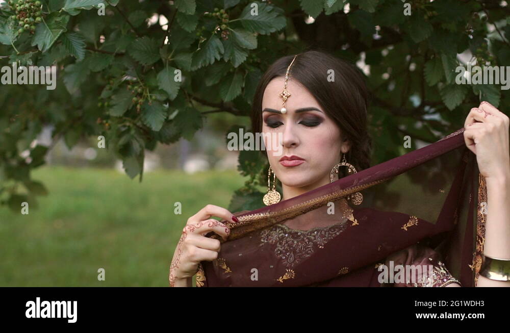 Portrait of girl in red Indian traditional dress Stock Video Footage ...