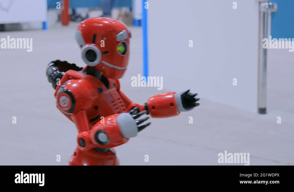 Cute humanoid robot talking and funny moving at exibition Stock Video ...