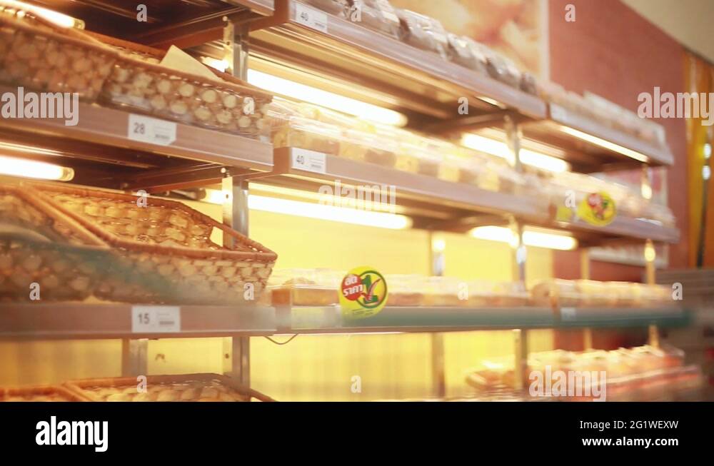 Shopping cart in bakery with fresh bread. Shopping cart In a grocery ...
