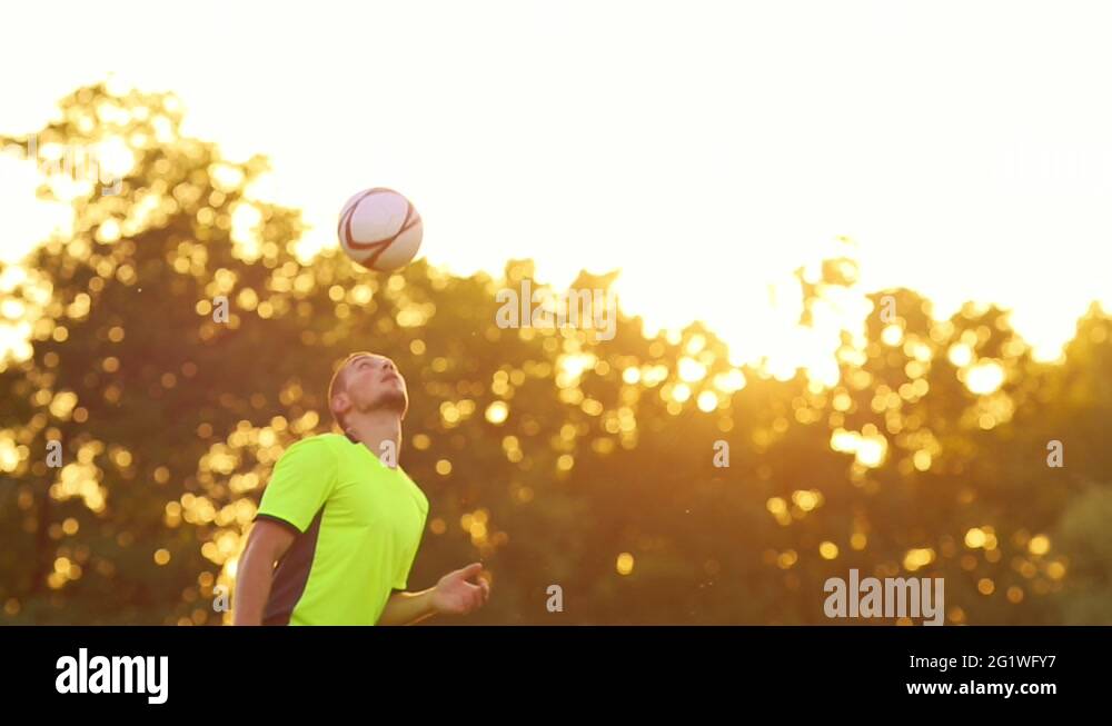 Professional football player header ball Stock Videos & Footage - HD ...