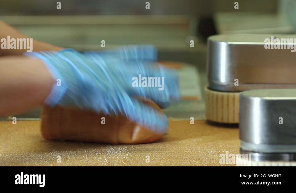 Cutting a loaf of bread into pieces and packing Stock Video Footage - Alamy