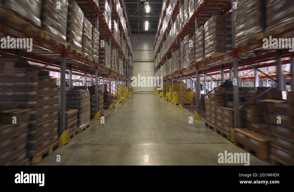 Logistic warehouse, movement of the chamber between the shelves in ...