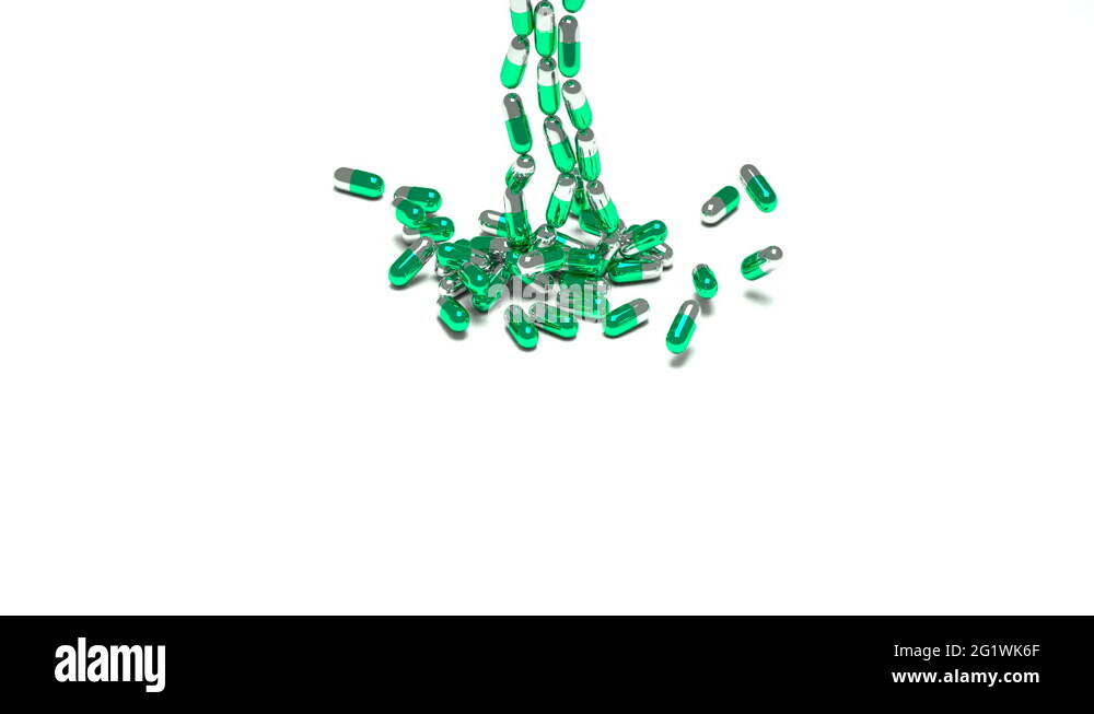 medicinal capsules falling on a white background Stock Video Footage ...