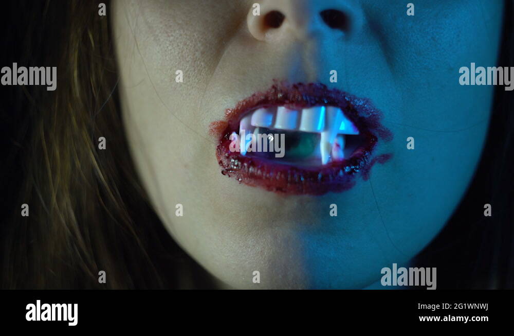 The eye moves in the mouth of a female vampire Stock Video Footage - Alamy