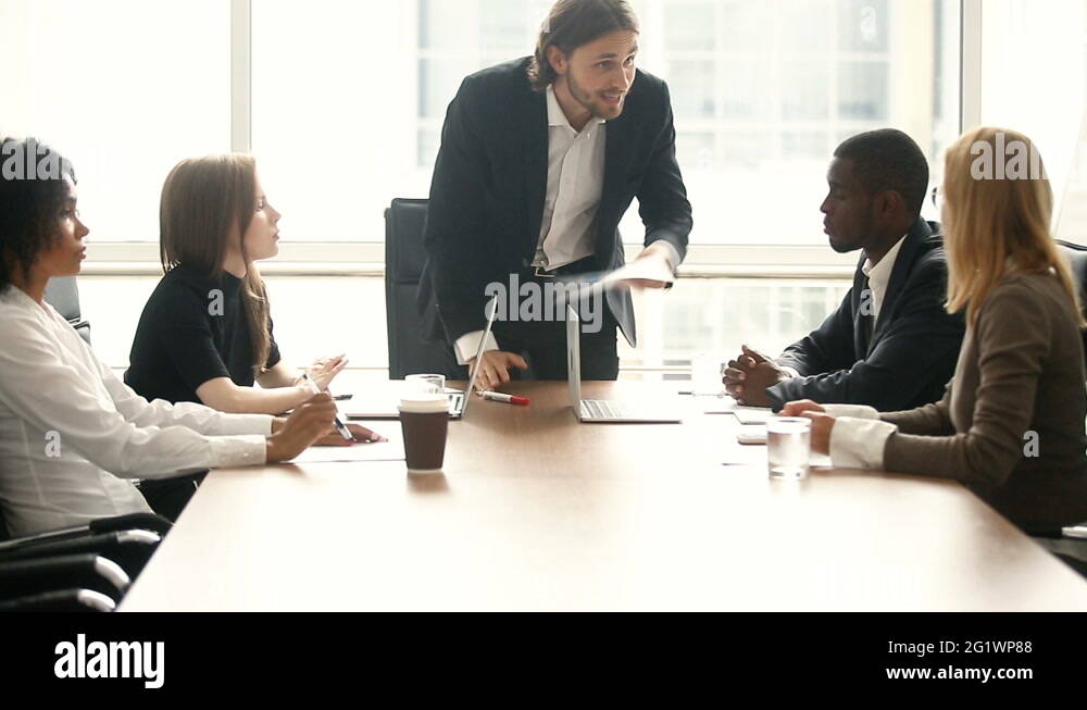 Angry boss scolding employee for bad work result at meeting Stock Video ...