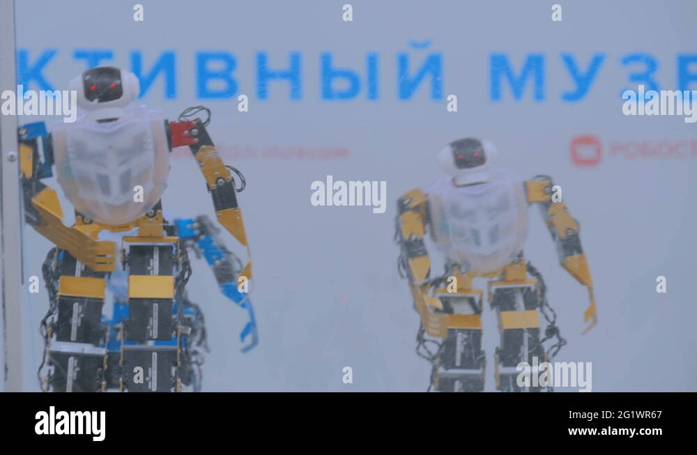 Humanoid robots dancing at robotic show Stock Video Footage - Alamy