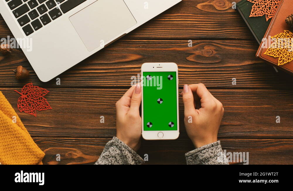 Woman scrolling, tapping on the touchscreen of the smartphone with ...