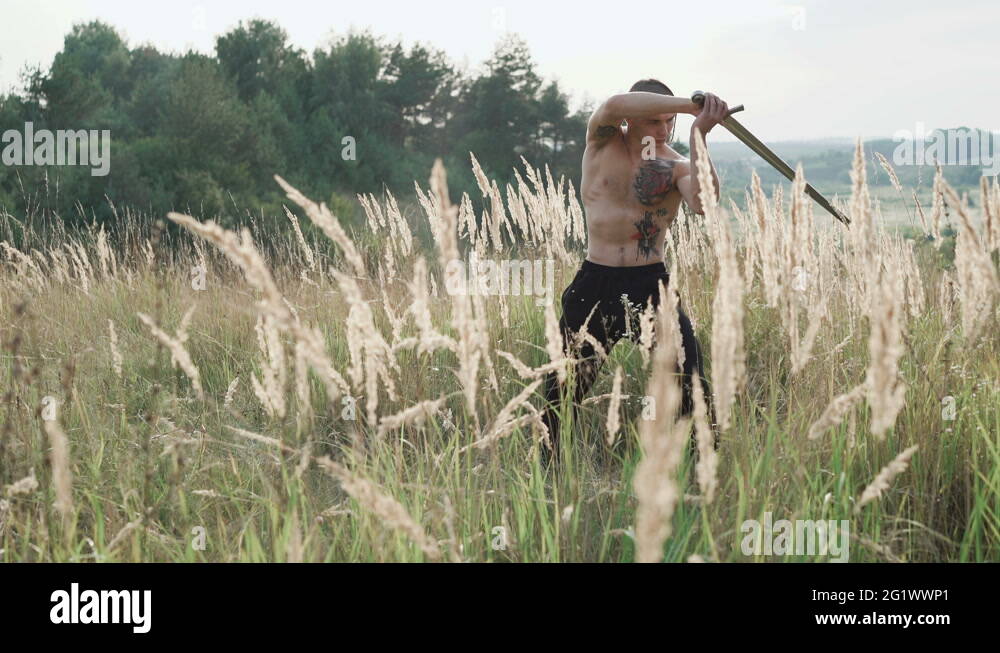 Modern cossack workouts with swords in the fields 4K Stock Video ...