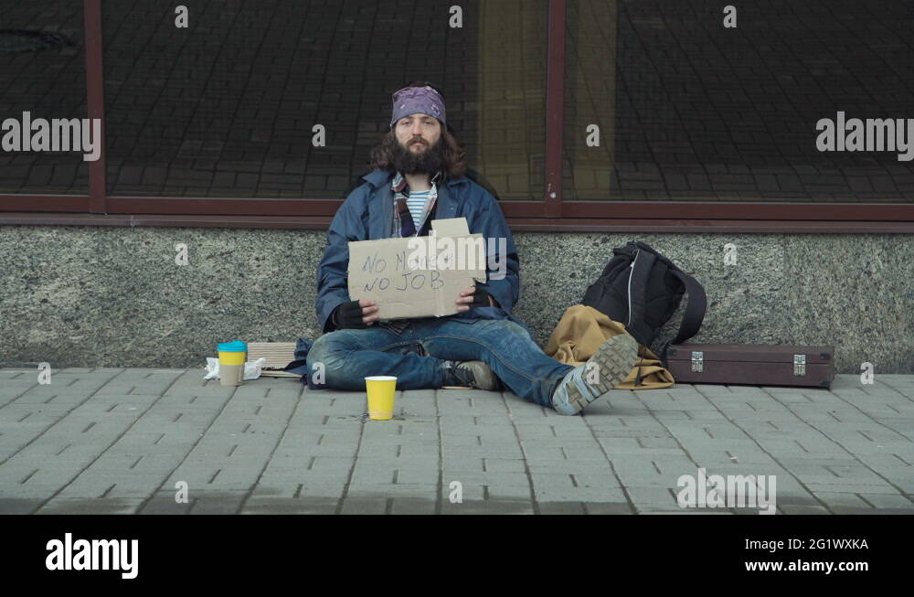 Homeless person with cardboard Stock Videos & Footage - HD and 4K Video ...