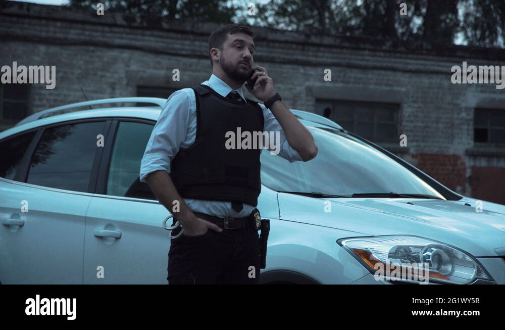 Policeman phone Stock Videos & Footage - HD and 4K Video Clips - Alamy