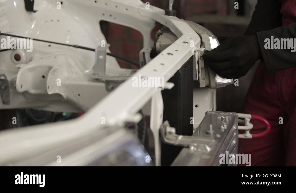 The mechanic works on rebuilding of sport rally car Stock Video Footage ...