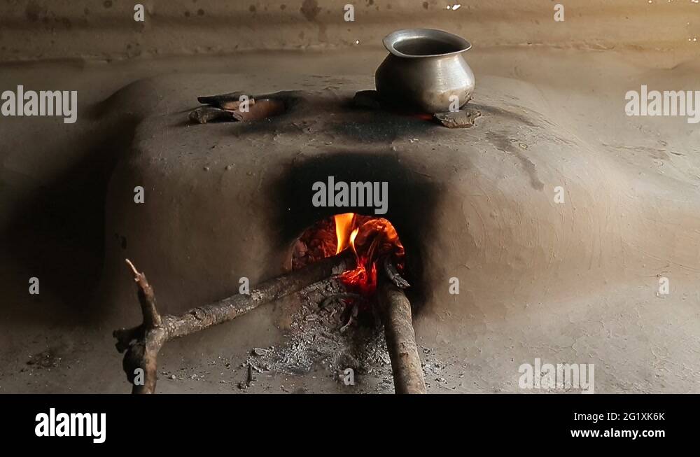 Traditional indian stone stove. India. Flame in stove Stock Video ...
