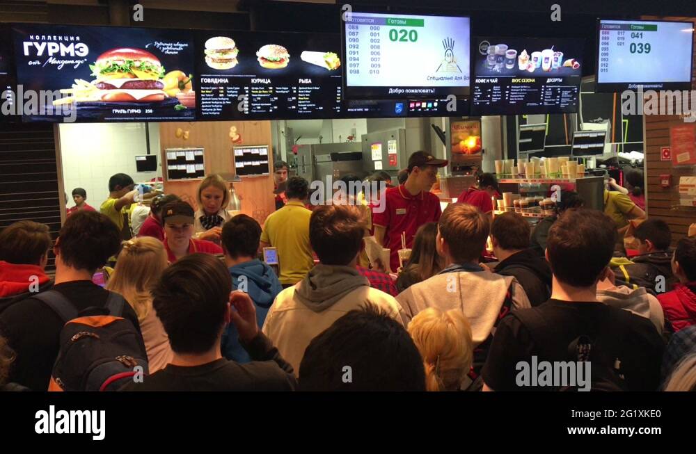 Many visitors of Mcdonalds, huge crowd in fast food restaurant Stock ...
