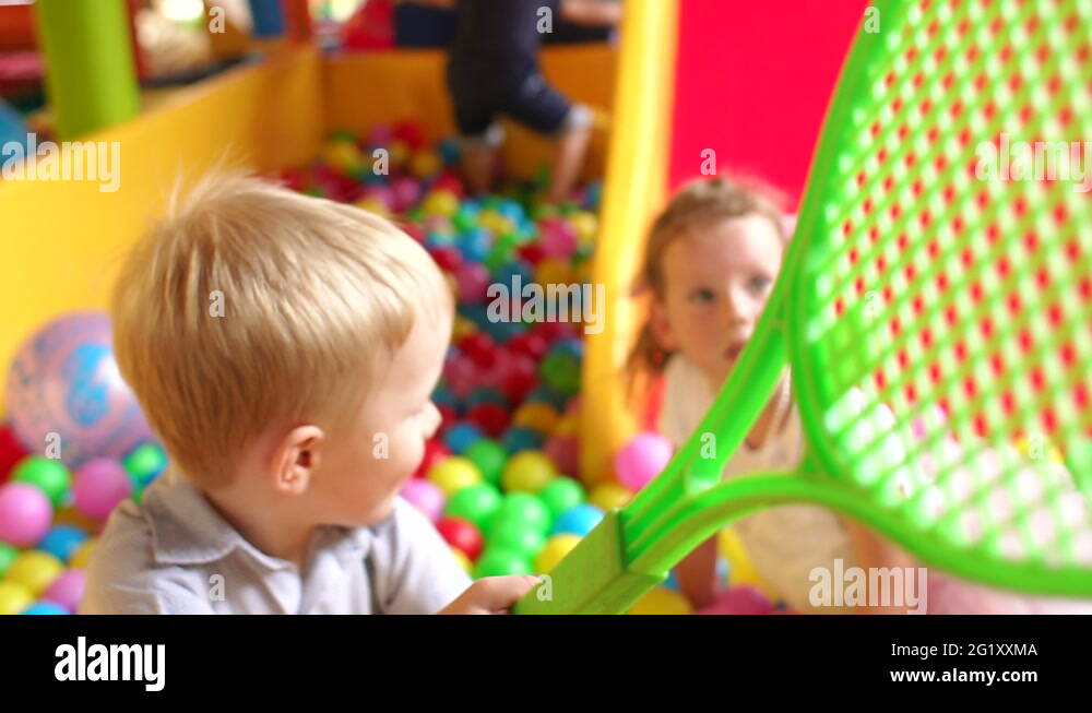 Two cheerful children playing on the Playground Stock Video Footage - Alamy