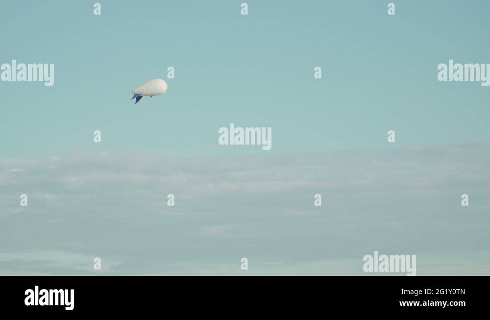 Airships Zeppelin gas helium floating in the sky in sun background on ...