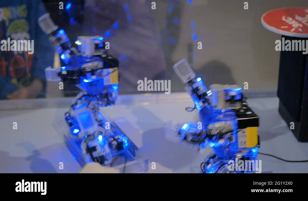 Humanoid robots dancing at robotic show Stock Video Footage - Alamy