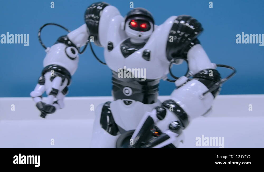 Humanoid robot moving hands and walking around at future exhibition ...