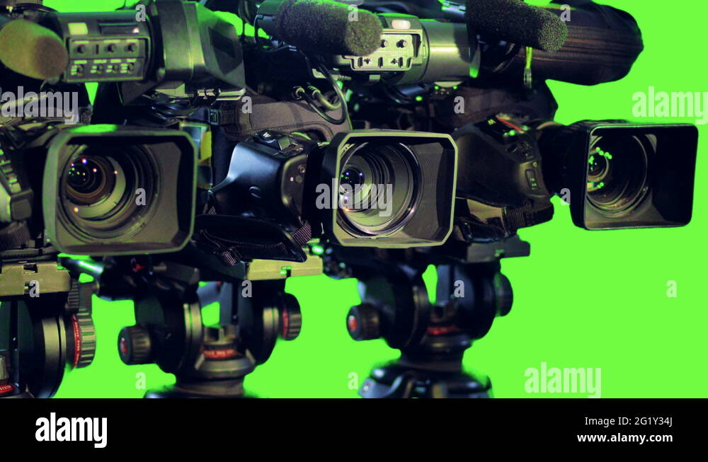 Professioanl isolated cameras on a green screen Stock Video Footage - Alamy